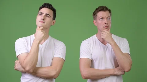Two young handsome men thinking together | Stock Video | Pond5