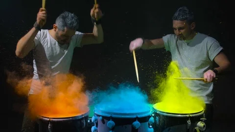 Two young men playing the drum. Colored ... | Stock Video | Pond5