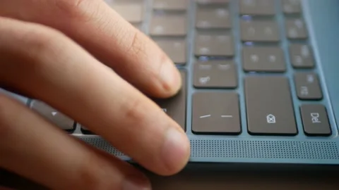 Typing and hitting the enter key on a sm... | Stock Video | Pond5