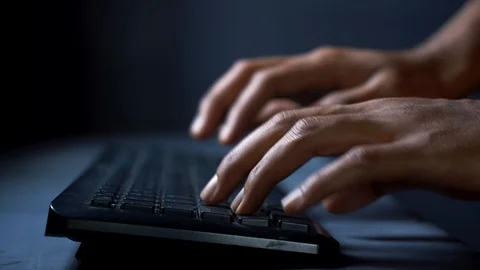 typing on computer keyboard side view 4k | Stock Video | Pond5