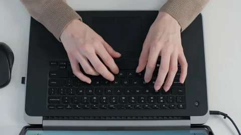 Typing hands on notebook computer keyboa... | Stock Video | Pond5