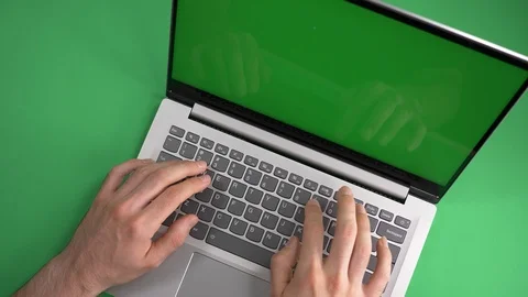 Typing on a Laptop With Green Screen on ... | Stock Video | Pond5