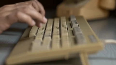Typing on an old computer. Dial telephon... | Stock Video | Pond5