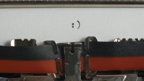 Typing smile emoticon on typewriter | Stock Video | Pond5