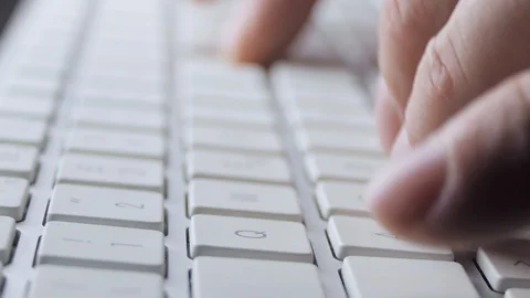typing on a white keyboard | Stock Video | Pond5
