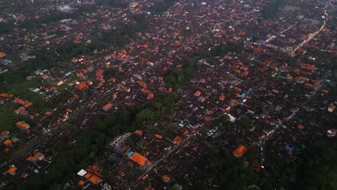 Ubud at dusk. Overpopulated and polluted... | Stock Video | Pond5