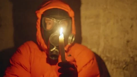 Ukraine war. A young man in a gas mask h... | Stock Video | Pond5