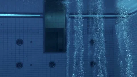 Underwater diver submerging in olympic s... | Stock Video | Pond5