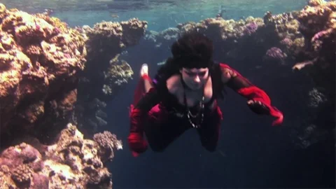 Underwater model free diver in red dress... | Stock Video | Pond5