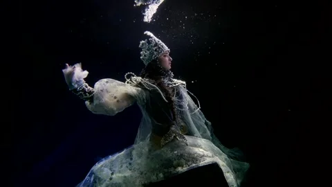 underwater princess floating in enigmati... | Stock Video | Pond5