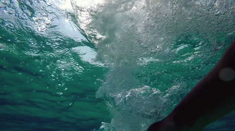 Underwater shot of hitting water surface... | Stock Video | Pond5