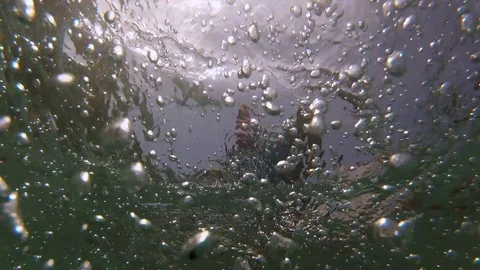 Underwater shot of rapid bubbles in wate... | Stock Video | Pond5
