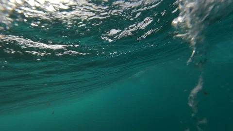 UNDERWATER SLOW MOTION Huge wave breakin... | Stock Video | Pond5
