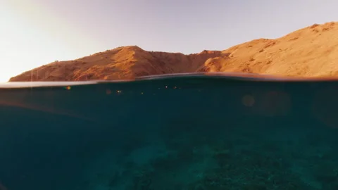 Underwater splitted view of the calm sea... | Stock Video | Pond5