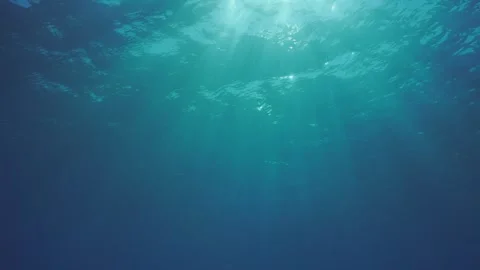 Underwater sun light shine under deep wa... | Stock Video | Pond5