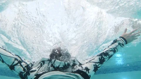 Underwater view of man falling into wate... | Stock Video | Pond5
