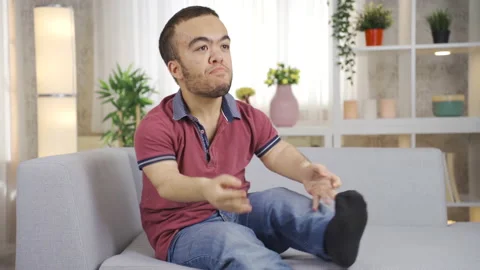 Unhappy and angry young dwarf man motiva... | Stock Video | Pond5