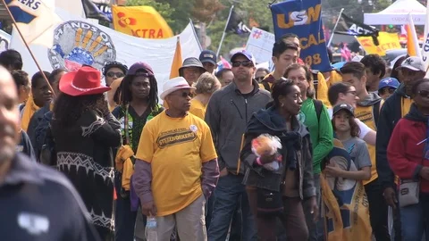 Union workers marching in solidarity for... | Stock Video | Pond5