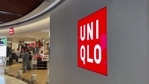 Uniqlo clothing store and brand logo sig... | Stock Video | Pond5