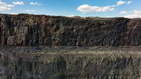 Unique side profile of a car driving on ... | Stock Video | Pond5