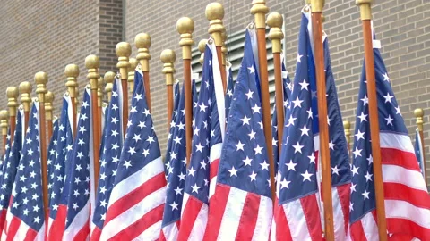 United States flags waving in the wind i... | Stock Video | Pond5