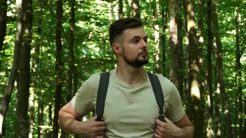 Unity with nature. Man walking and touch... | Stock Video | Pond5