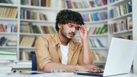 University student suffering from headac... | Stock Video | Pond5