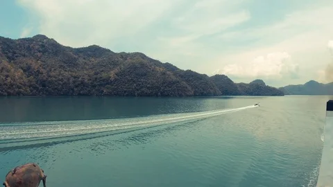 unknown boat crossing fast with sea view... | Stock Video | Pond5