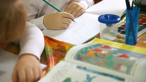 unknown boy and girl in class draw paint... | Stock Video | Pond5