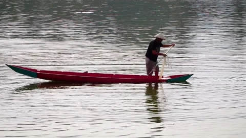 Unknown fisherman searching for fish usi... | Stock Video | Pond5