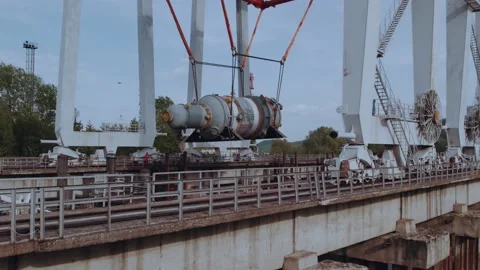 Unloading of a chemical reactor in a por... | Stock Video | Pond5