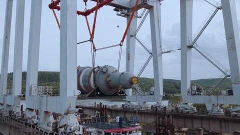 Unloading of a chemical reactor in a por... | Stock Video | Pond5