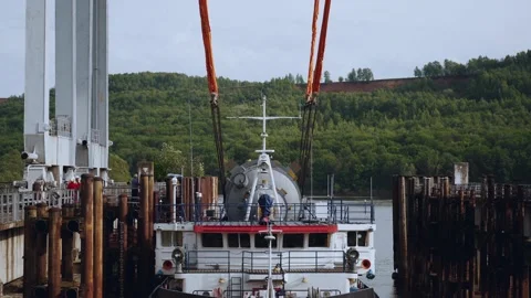 Unloading of a chemical reactor in a por... | Stock Video | Pond5