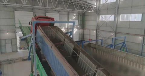 Unloading wheat from a truck to a silo, ... | Stock Video | Pond5
