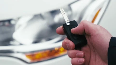 Unlocking the car by the car's key remot... | Stock Video | Pond5