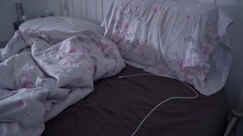 Unmade bed in master bedroom. Real life ... | Stock Video | Pond5