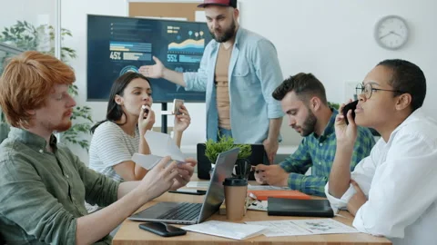 Unmotivated employees ignoring business ... | Stock Video | Pond5