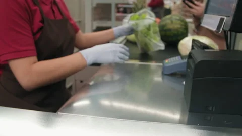 Unrecognizable Cashier Hands Scanning Fo... | Stock Video | Pond5