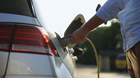 Man Electric Car Stock Videos – Royalty-Free HD & 4K Videos | Pond5
