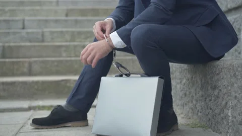 Unrecognizable secret agent sitting on u... | Stock Video | Pond5