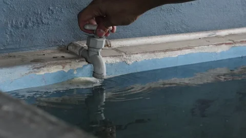 Unsafe drinking water comes out of tap i... | Stock Video | Pond5
