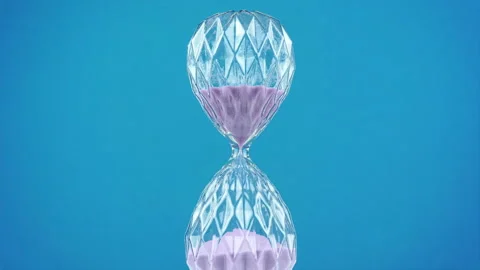 Unusual Rotating Hourglass Flask On A Bl... | Stock Video | Pond5