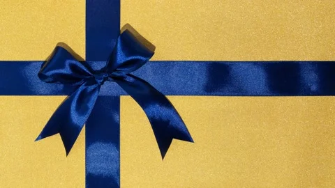 Unwrapping gift revealing a green screen... | Stock Video | Pond5