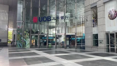 UOB logo at the entrance of the UOB Buil... | Stock Video | Pond5