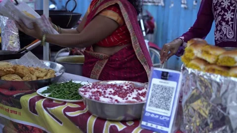 UPI QR code scanner at street food vendo... | Stock Video | Pond5