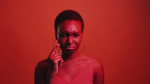 upset grimace red neon sad woman crying ... | Stock Video | Pond5
