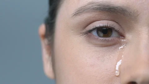 Upset woman crying, drop of tear running... | Stock Video | Pond5