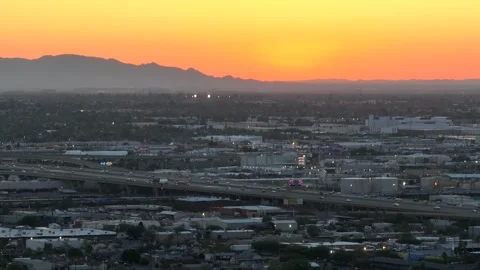 Urban sprawl of Phoenix, Arizona at suns... | Stock Video | Pond5
