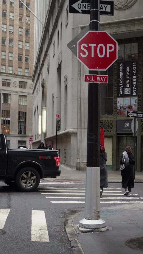 Urban Street Scene featuring a Stop Sign | Stock Video | Pond5