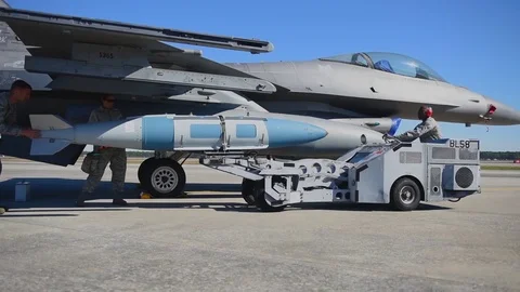U.S. Air Force bomb loader loading munit... | Stock Video | Pond5